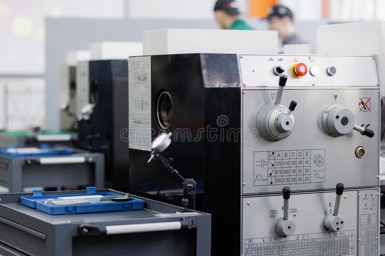 Machinery Operation in a Bustling Manufacturing Facility with Skilled ...