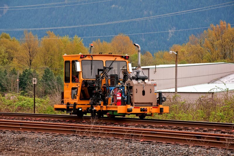 Machinery Work on Railroad Tracks Stock Image - Image of mountains ...