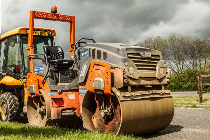 Construction Digger Loader in Farm Yard with Barn Editorial Stock Image ...