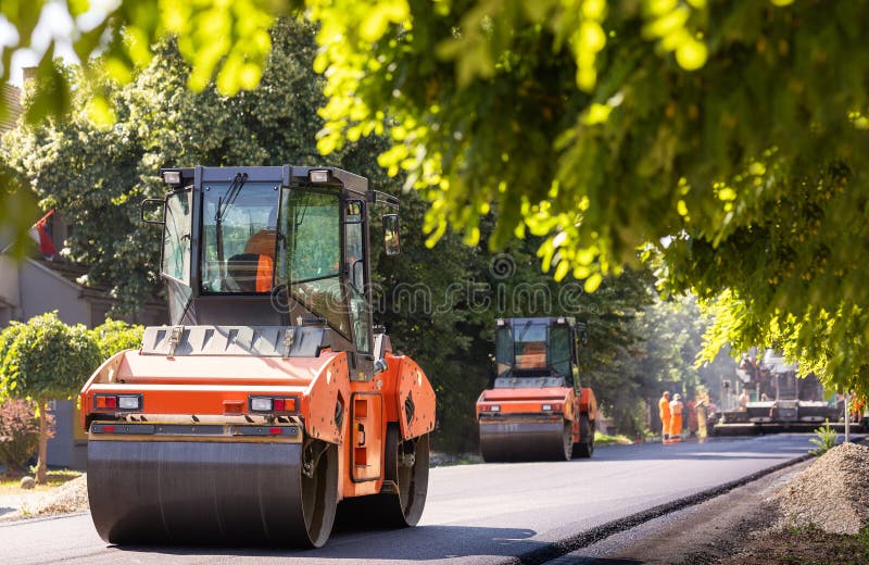 Compactor Roller during Road Construction at Asphalting Work Stock ...