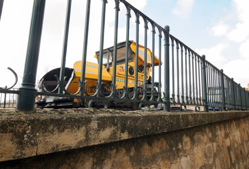 Machines Performing Asphalting and Paving Work on a City Road ...