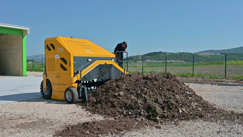 Machines Processing Organic Waste into Eco-friendly Compost at a ...