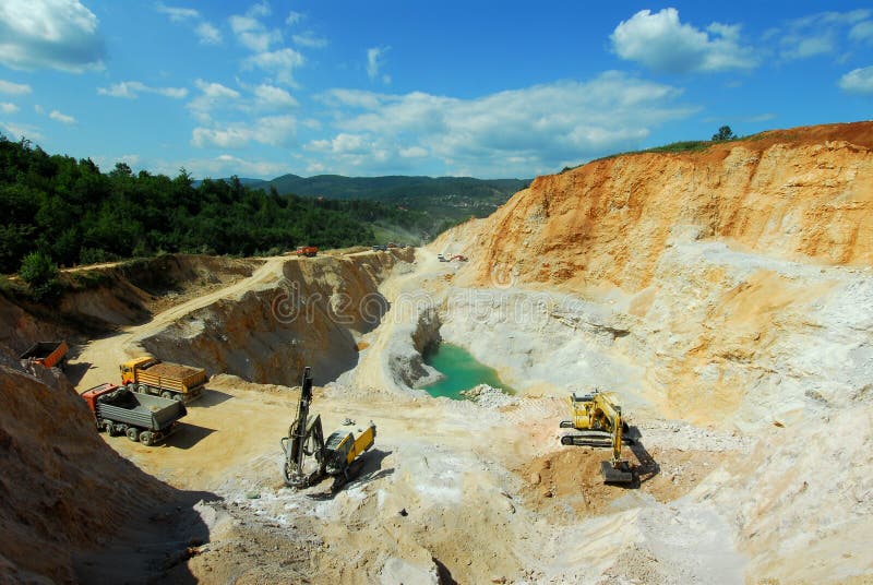 Machines in quarry stock photo. Image of tractor, heavy - 73898590