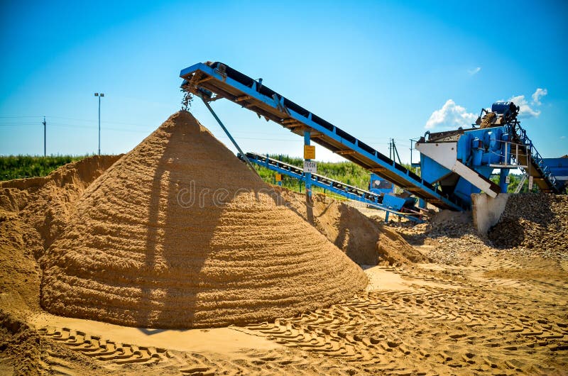 Machines Work On Loading And Unloading Material For The Production Of ...