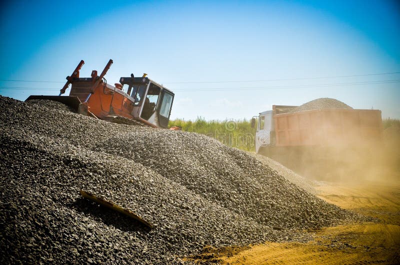 Machines Work on Loading and Unloading Material for the Production of ...