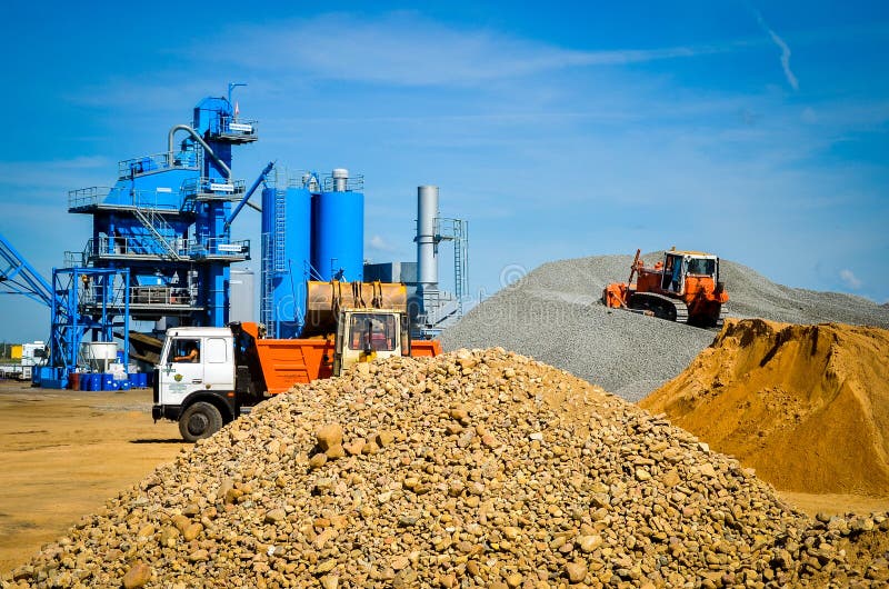 Machines Work on Loading and Unloading Material for the Production of ...