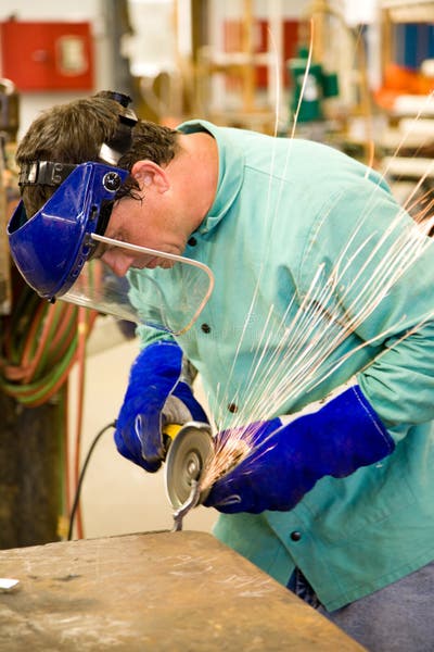 Machinist at Work stock photo. Image of factory, glow - 7303648