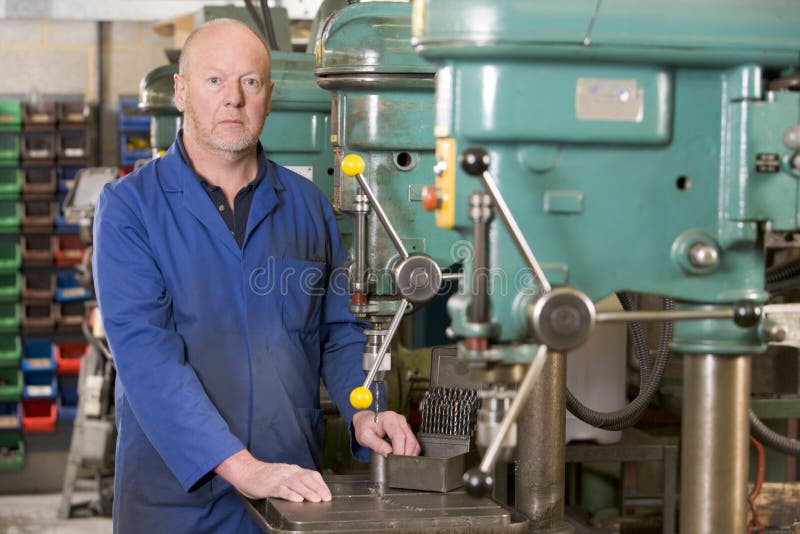 Machinist Working on Machine Stock Photo - Image of factory, machinery ...