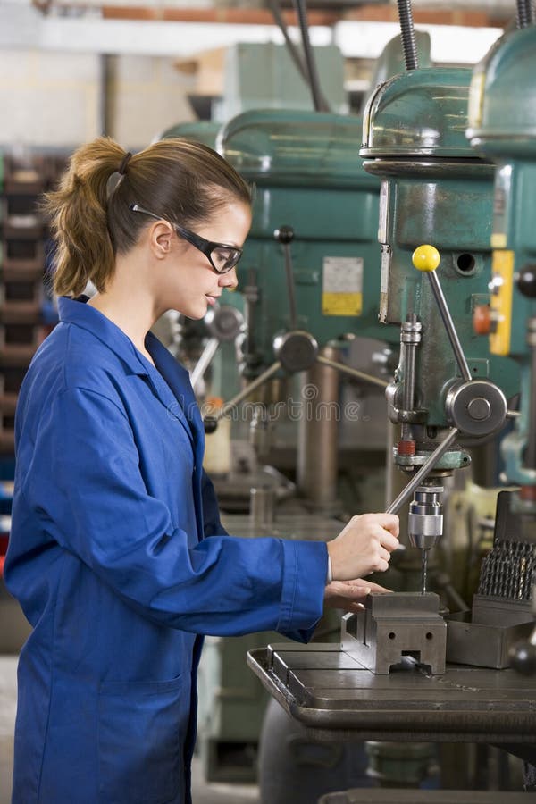 Two Machinists Working on Machine Stock Image - Image of drill, mature ...