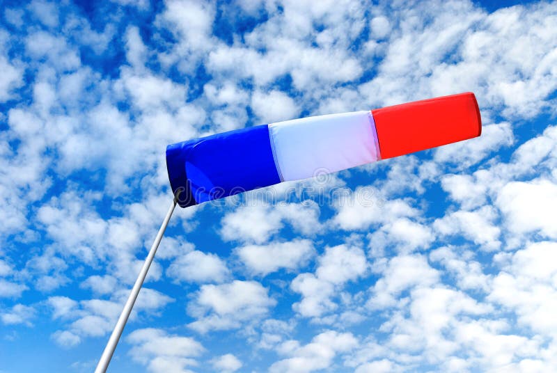 French Windsock White Cumulus Clouds in Blue Sky Stock Image - Image of ...
