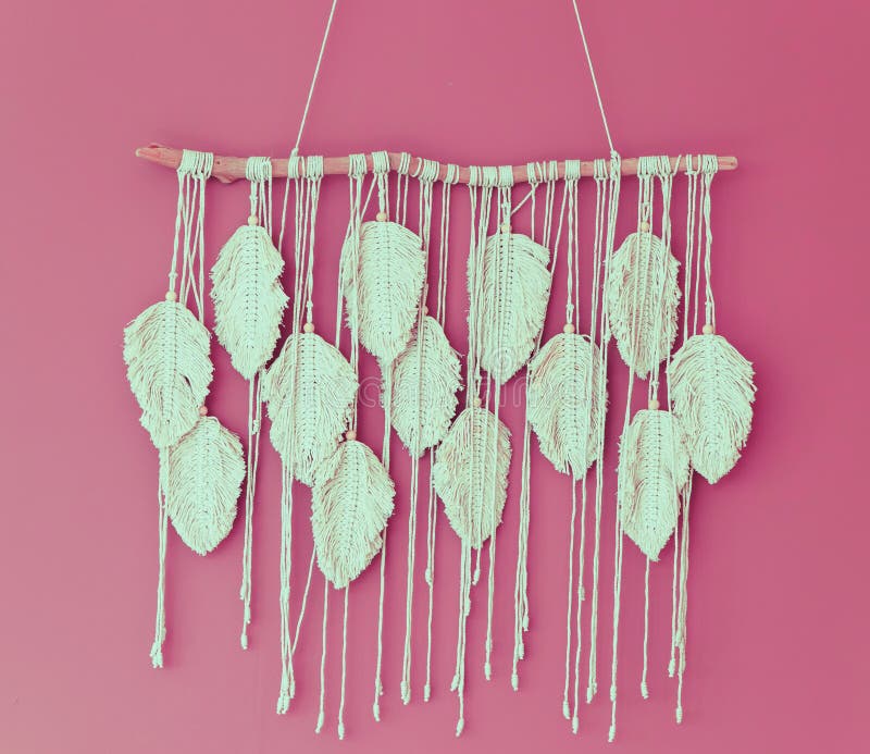 Macrame Hangs on the Pink Wall. the Fringe is White in Close-up Stock ...