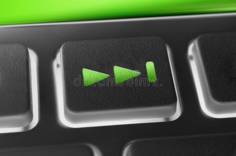 Macro of a Black Skip Forward Button of a Black Remote Control with ...