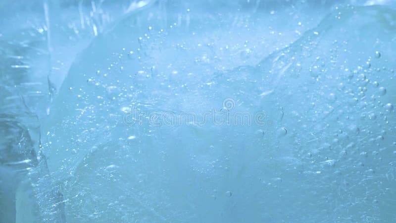 Macro Blue Broken Ice Texture Background with Splashing Water Surface ...