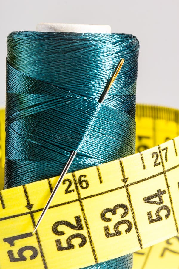 Macro Blue Spool of Thread with Measuring Tape Stock Photo - Image of ...