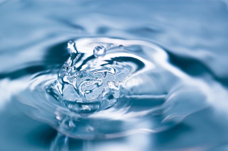 Macro blue water splash stock image. Image of closeup - 4334331