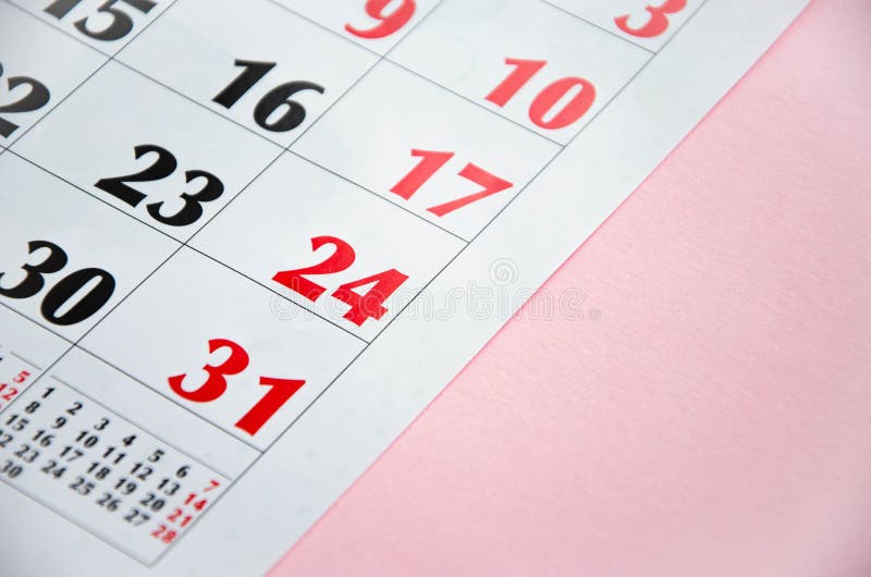 Macro Calendar from Different Angles on a Yellow and Pink Background ...