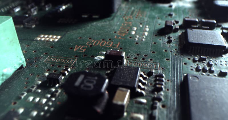 Macro Camera Moving Slowly Over Printed Circuit Board, Showing Computer ...