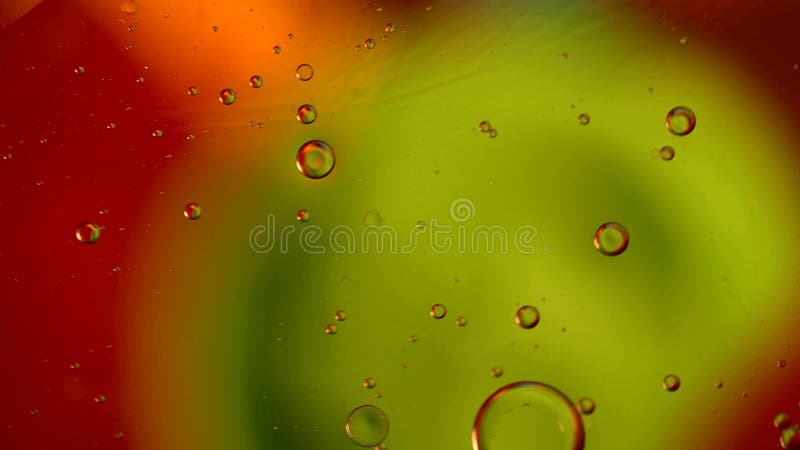 Macro Close-up Abstract Movement of Oil Droplets Floating on Water ...