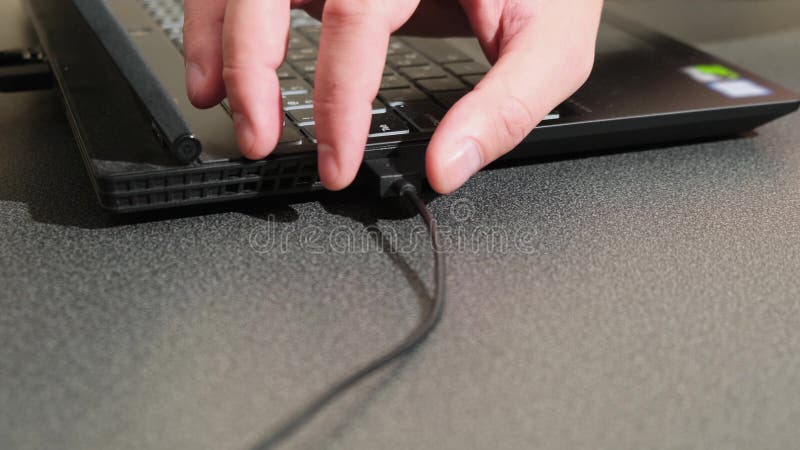 Macro Close Up of a USB Flash Memory Drive Being Plugged in and Out ...