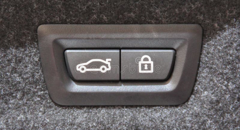 A Macro Close Up View of Car Trunk Lockout Buttons Stock Photo - Image ...