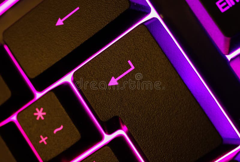 Macro Closeup of Pink Purple Illuminated Return Key on Computer ...