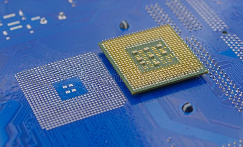 Computer Processor on Blue Motherboard Circuit Stock Image - Image of ...