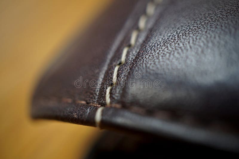 Macro Detail of a White Thread Stitching Black and Brown Stitched ...