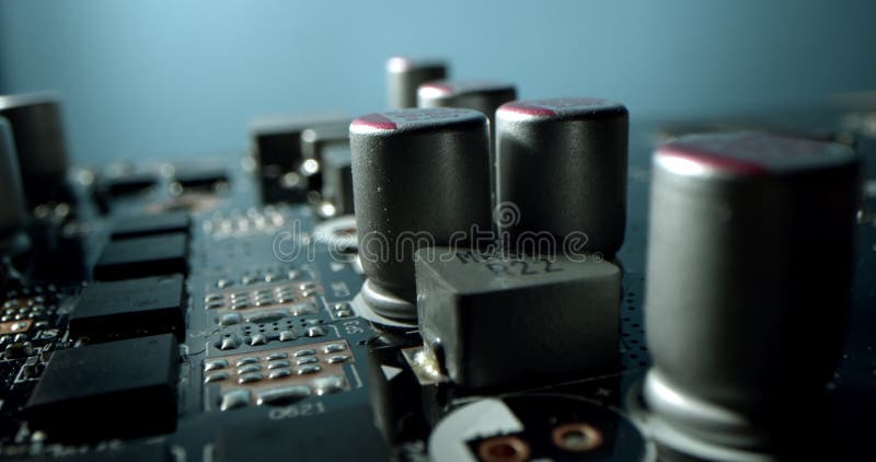 Video: Macro dolly shot side view of a computer electrical circuit with ...