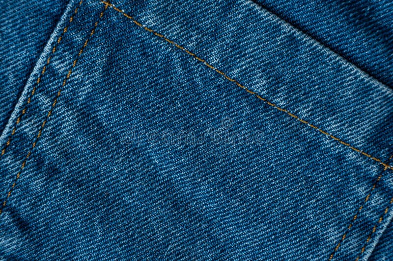 Macro Fabric Texture of Cotton Blue Jeans. Pocket and Thread Stitching ...