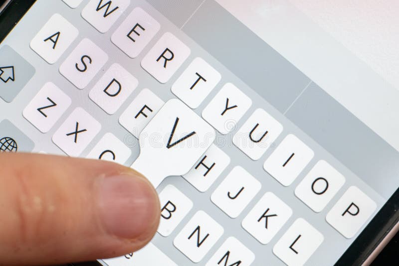 A Macro of a Finger Typing Text on the Touch Screen Keyboard of Mobile ...