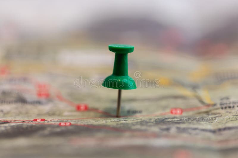 Macro of Green Pin Marks a Location of a Destination on a Map Stock ...