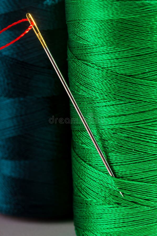 Macro Green Spool of Thread with Needle Stock Image - Image of coil ...