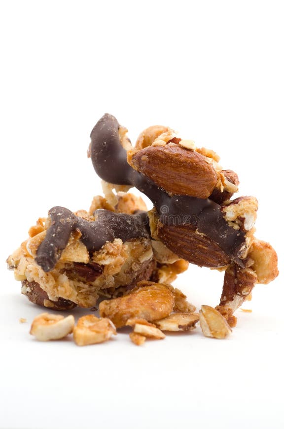 Macro Image of Nuts and Chocolate Snacks Isolated on White Stock Image ...