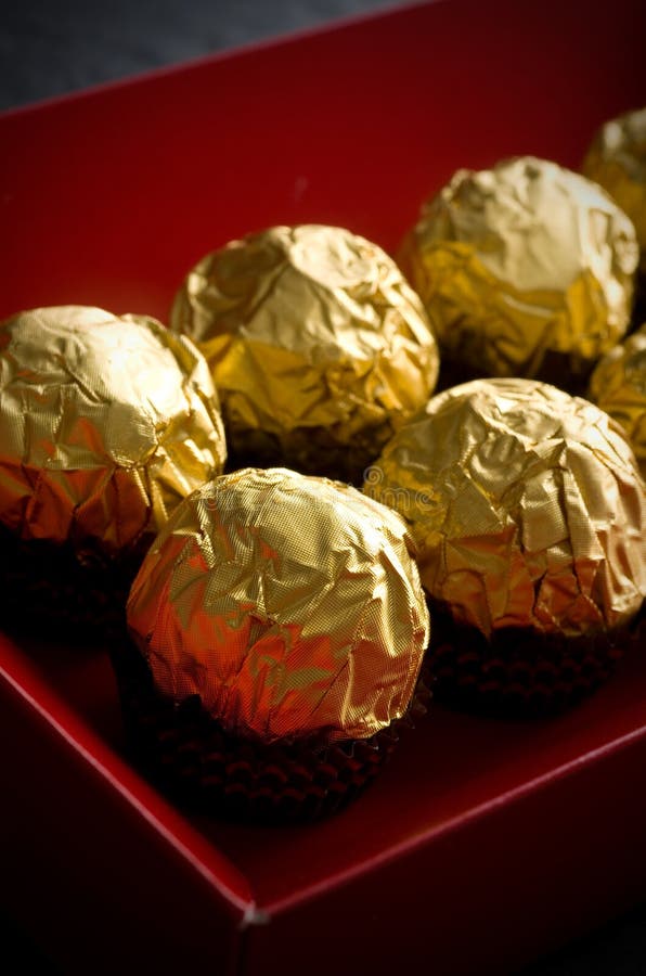 Macro Image of Red Box with Chocolate in Gold Wrapping Stock Image ...