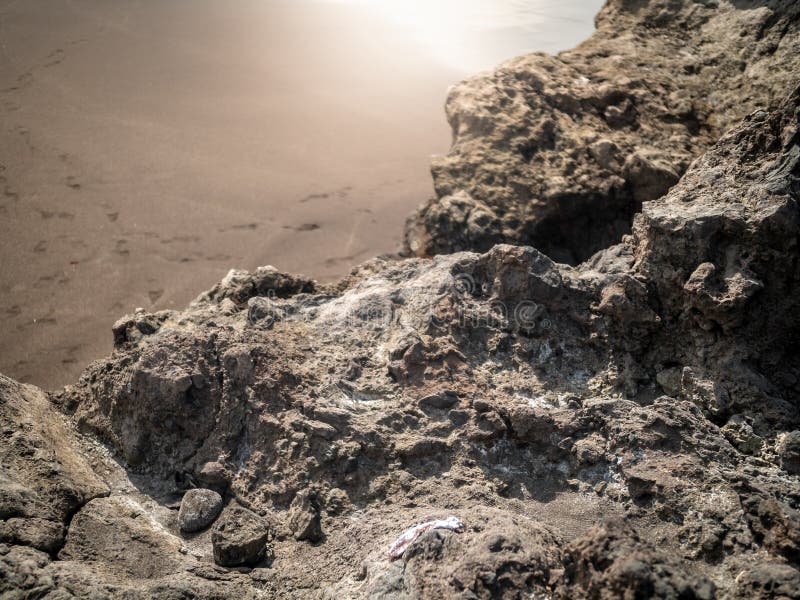 Macro Image of Sharp Cliffs and Rocks on the Sandy Ocean Beach Stock ...