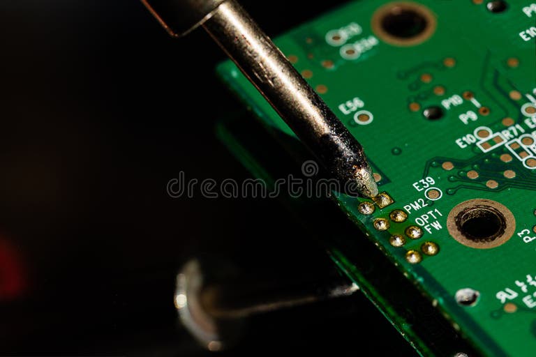 Macro Image of a Soldering Iron Tip Being Applied To a Component ...