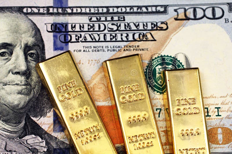 Three Gold Bars with an American One Hundred Dollar Bill Stock Photo ...
