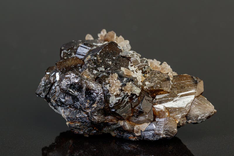 Raw Cassiterite Tin Ore Stone on Black Stock Photo - Image of ...