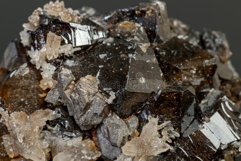 Raw Cassiterite Tin Ore Stone on Black Stock Photo - Image of ...