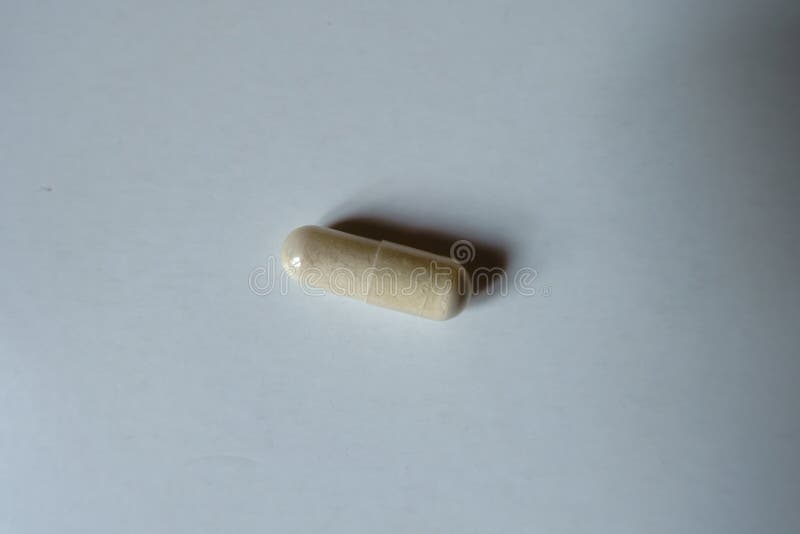 Macro of Light Beige Capsule of Saccharomyces Boulardii Probiotic Stock ...