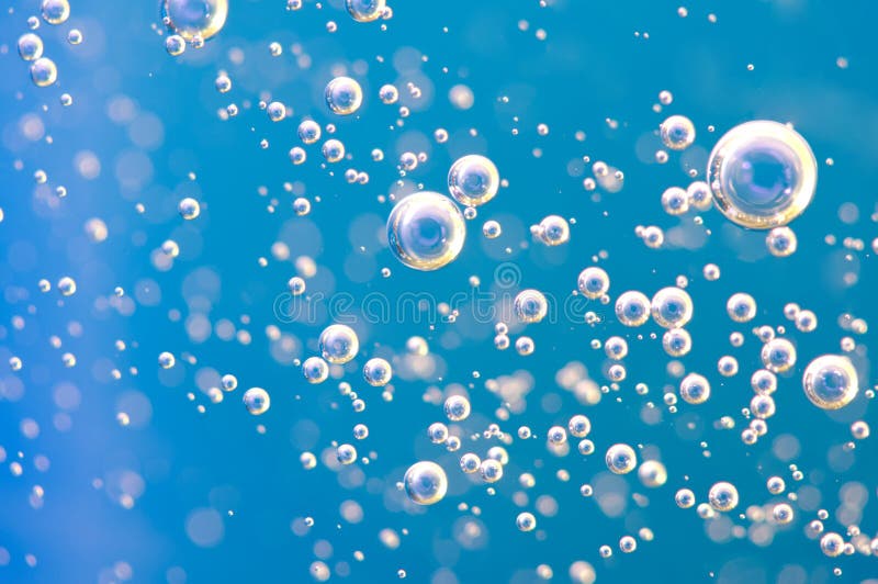 Macro Oxygen Bubbles in Water on Blue Background Stock Image - Image of ...