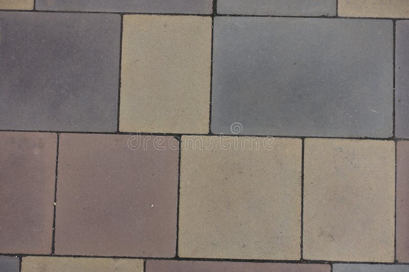 Macro of Pavement Made of Pink, Yellow, Brown and Gray Concrete Blocks ...