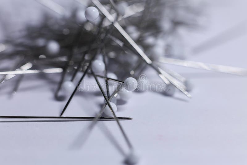 A Bunch of Pins and Needles on a Table Stock Photo - Image of disease ...