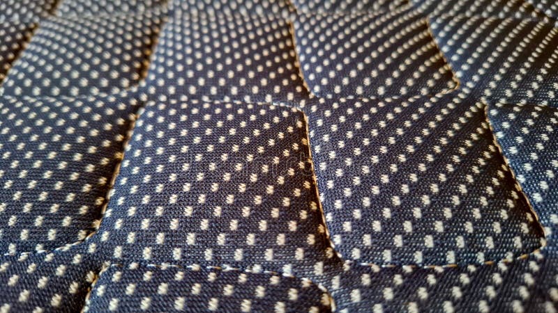 Close-Up of Quilted Fabric with Blue and White Dot Pattern Stock Photo ...