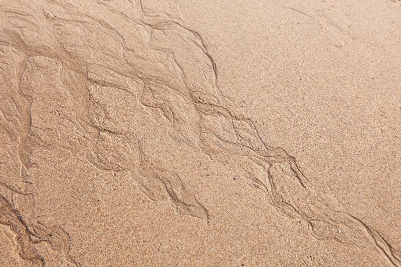 Macro Photo with Patterns on the Wet Coastal Sand Stock Photo - Image ...