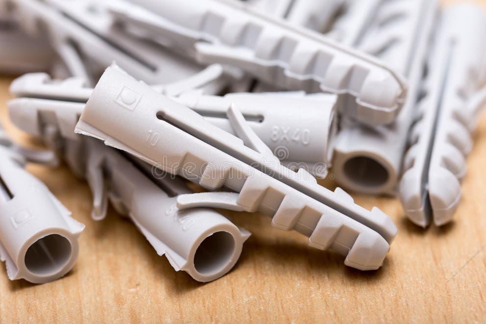 Macro Photo of Plastic Dowels on the Wooden Table Stock Image - Image ...