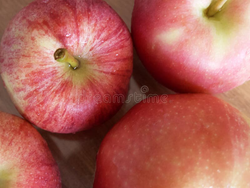 Macro Photo of Ripe Red Apples of Gala and Ligol Varieties. Apple Close ...