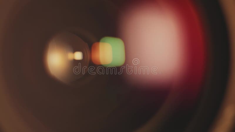 Lights Reflecting in the Camera Lens Glass. Stock Video - Video of ...