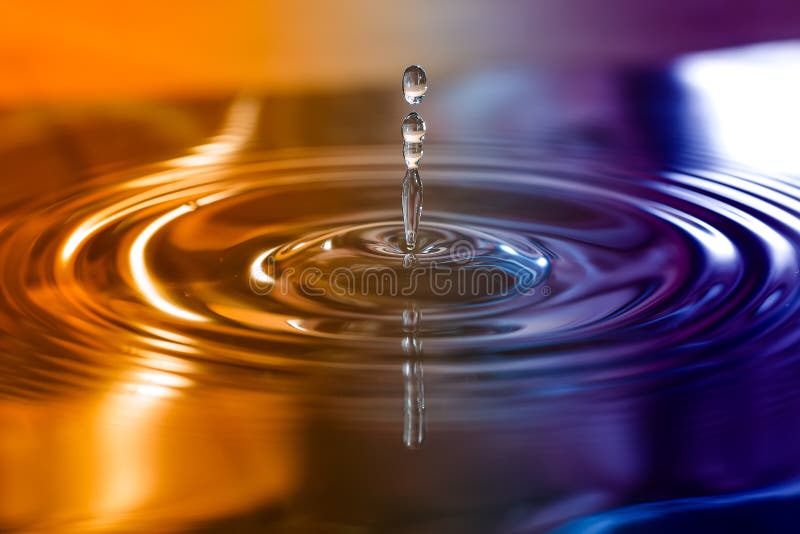 Macro Photo of Water Drops Falling into a Pool of Water Stock Photo ...