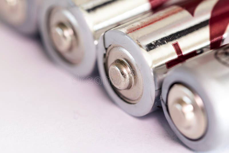 A Macro Portrait of the Plus or Positive Side of a Couple of Triple a ...